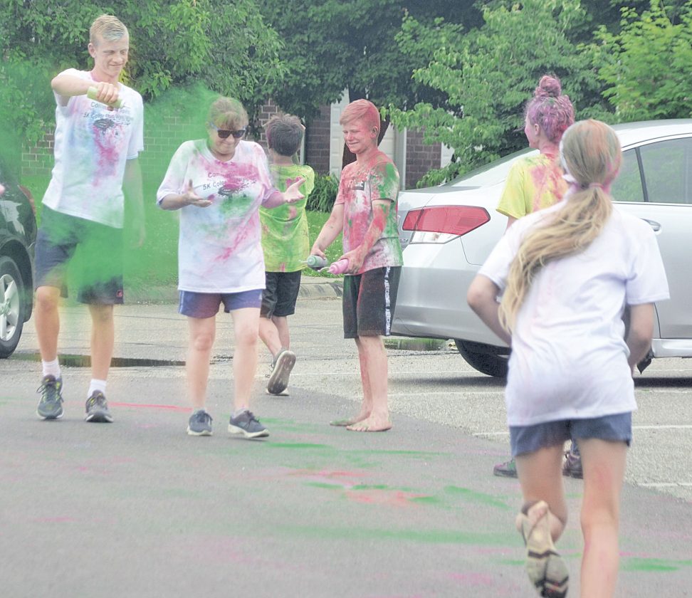 Runners show community spirit in 5K Color Run for Williamstown ...